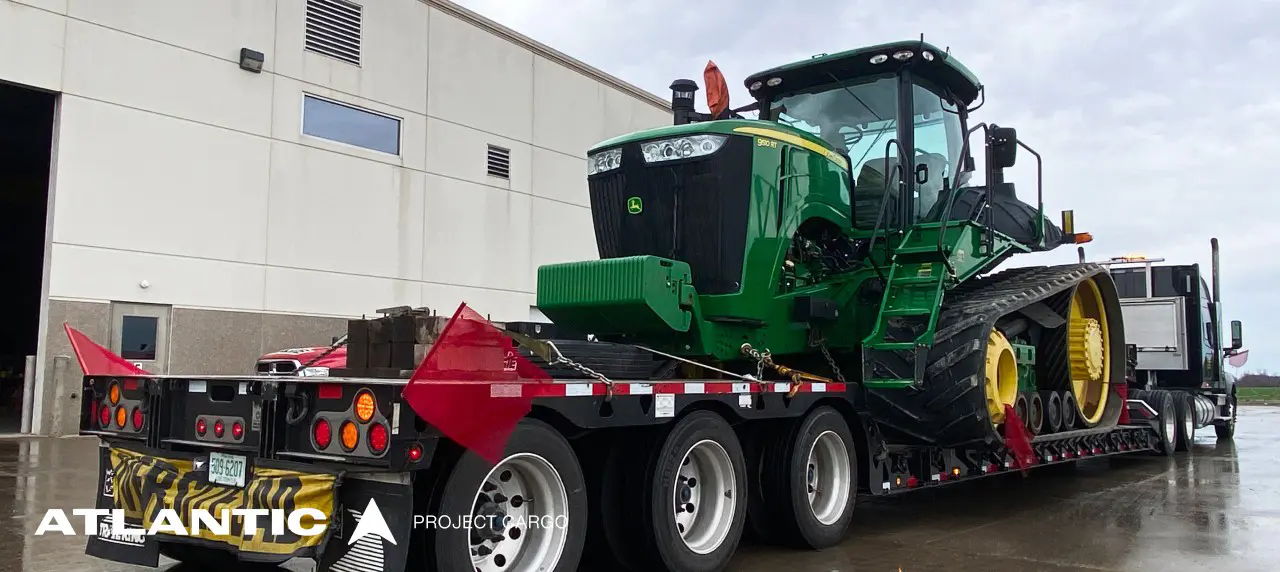 Tractor Transport. Farm Equipment Shipping Company Atlantic Project Cargo